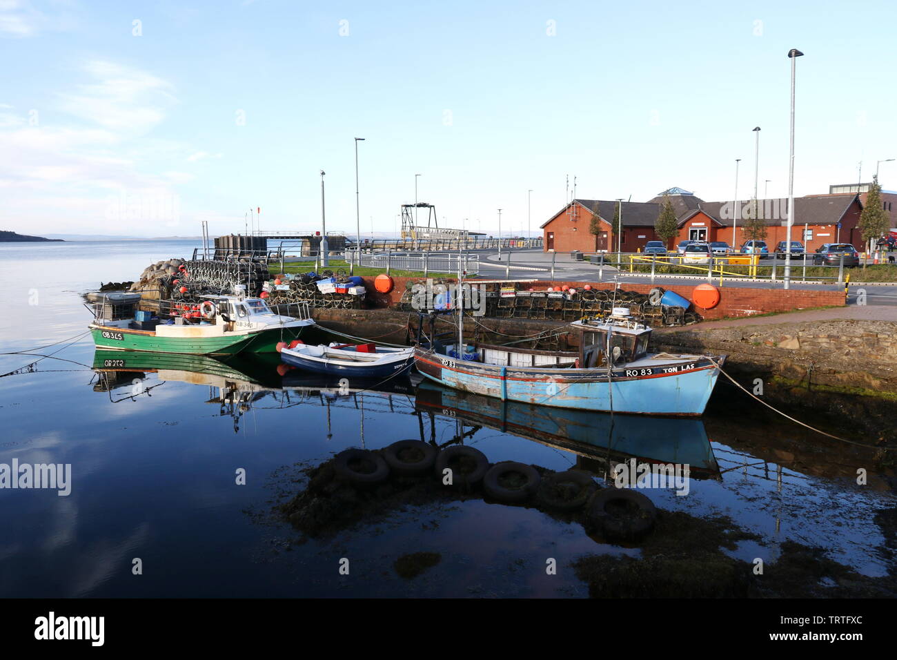 Fishing boats in the port of Brodick, Isle of Arran, Sotland, United ...