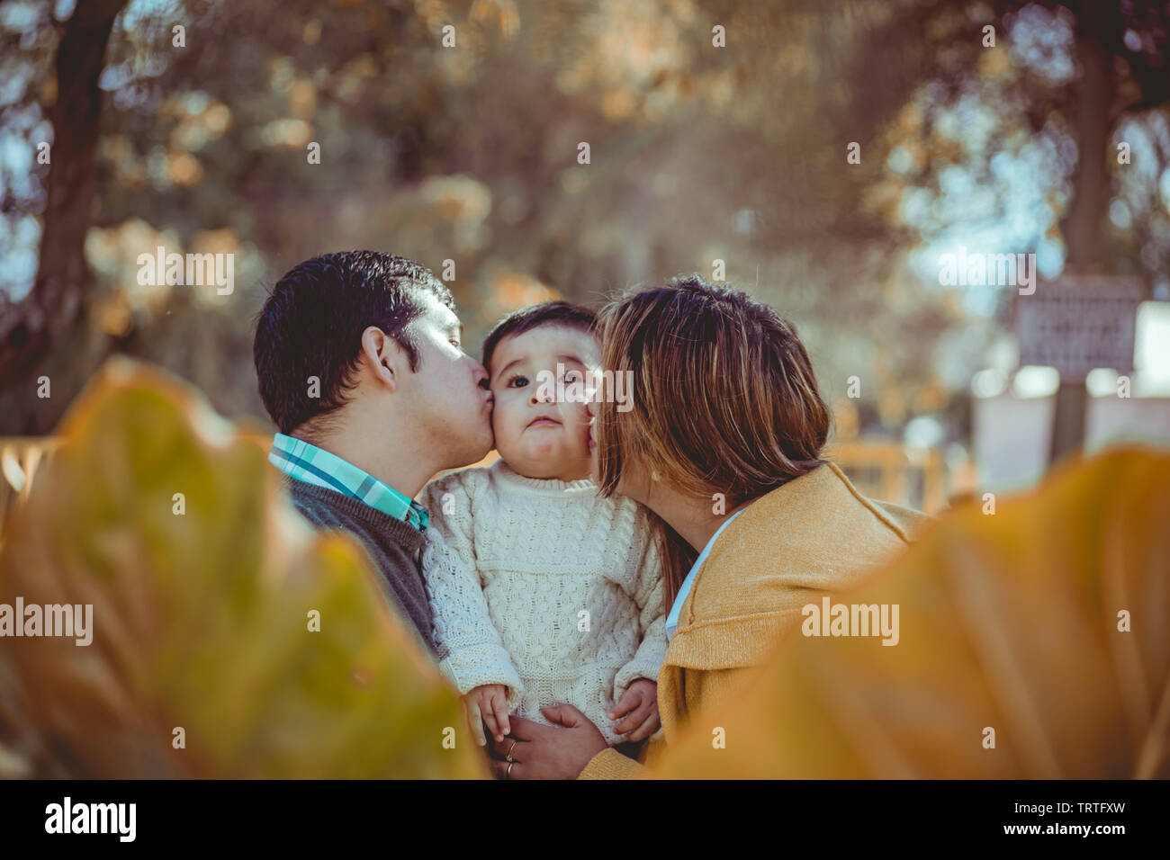 Happy family with two children Stock Photo - Alamy