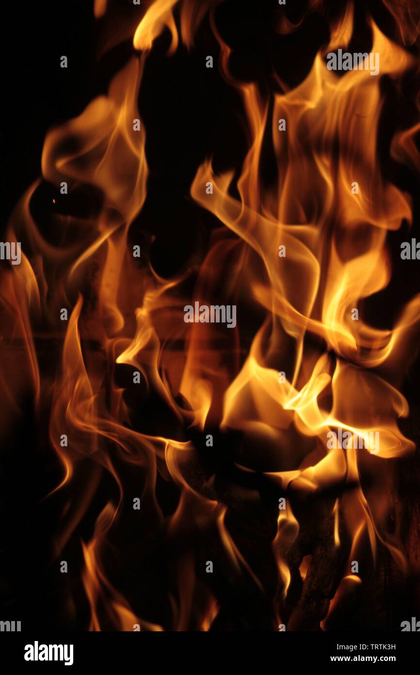 Fire scene texture with black background Stock Photo - Alamy