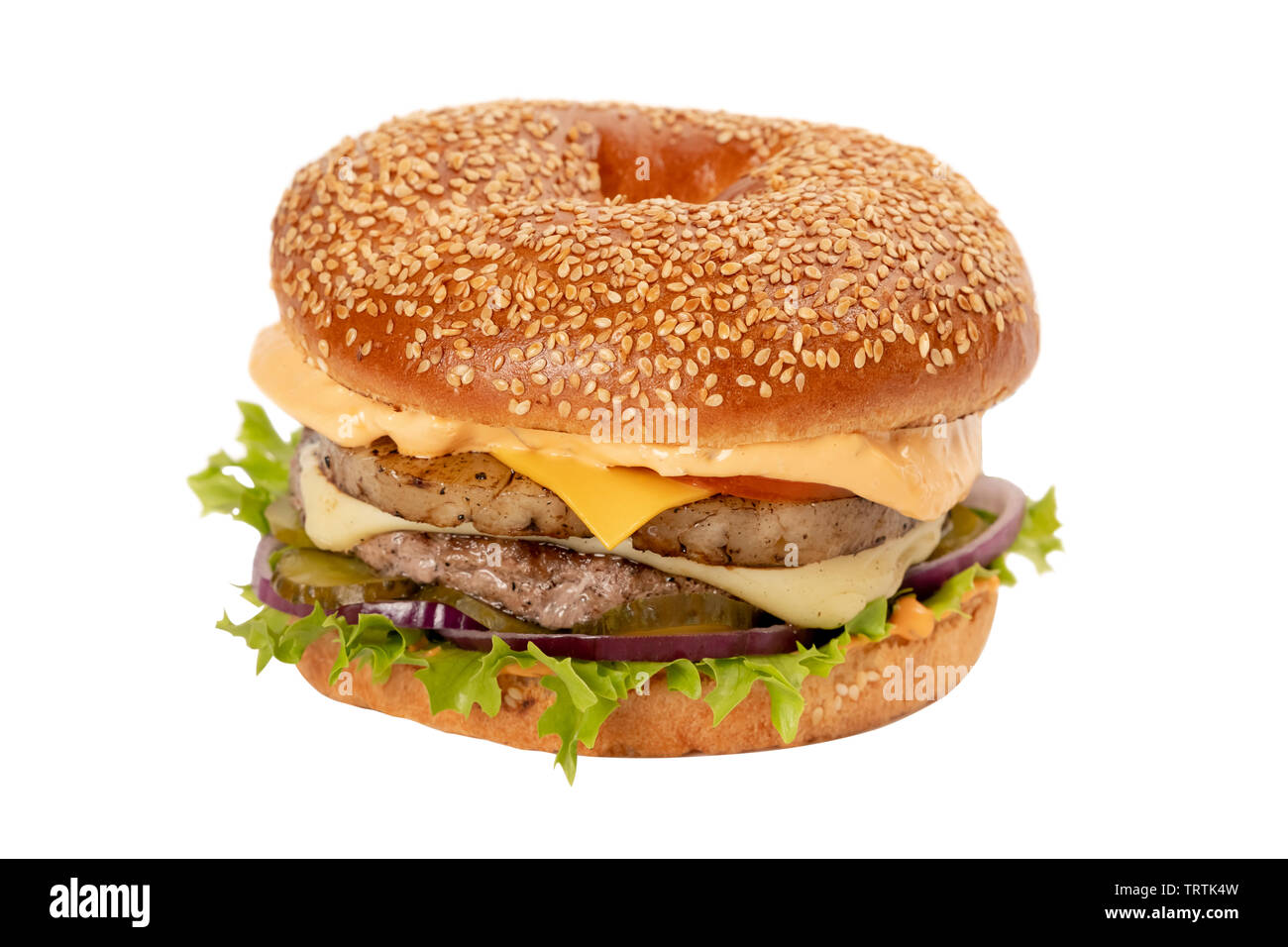 Juicy Burger on white isolated background. Bun with sesame seeds. The ...