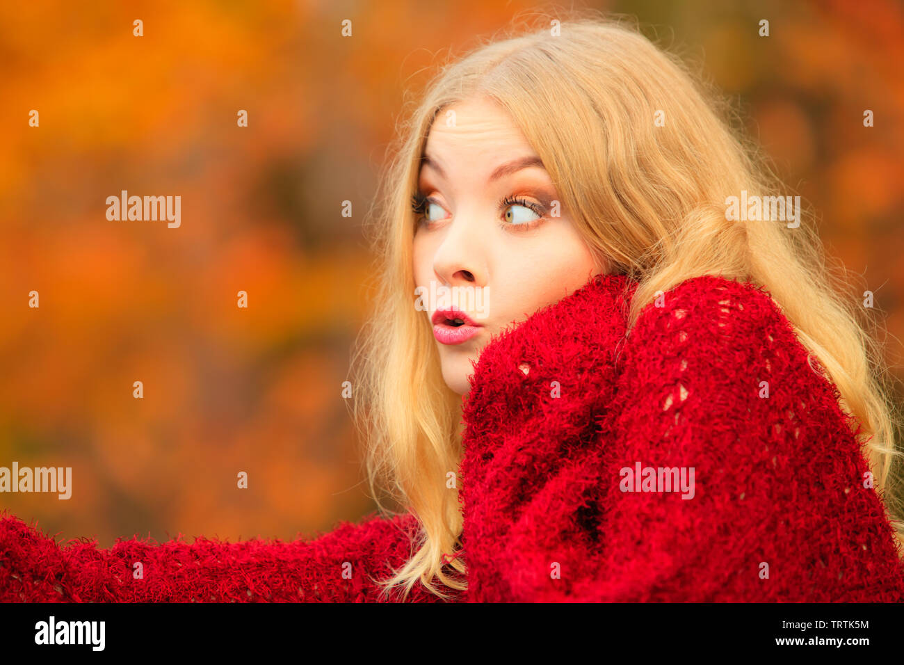 Portrait of blonde woman outdoor. Funny cute girl having fun surprised ...
