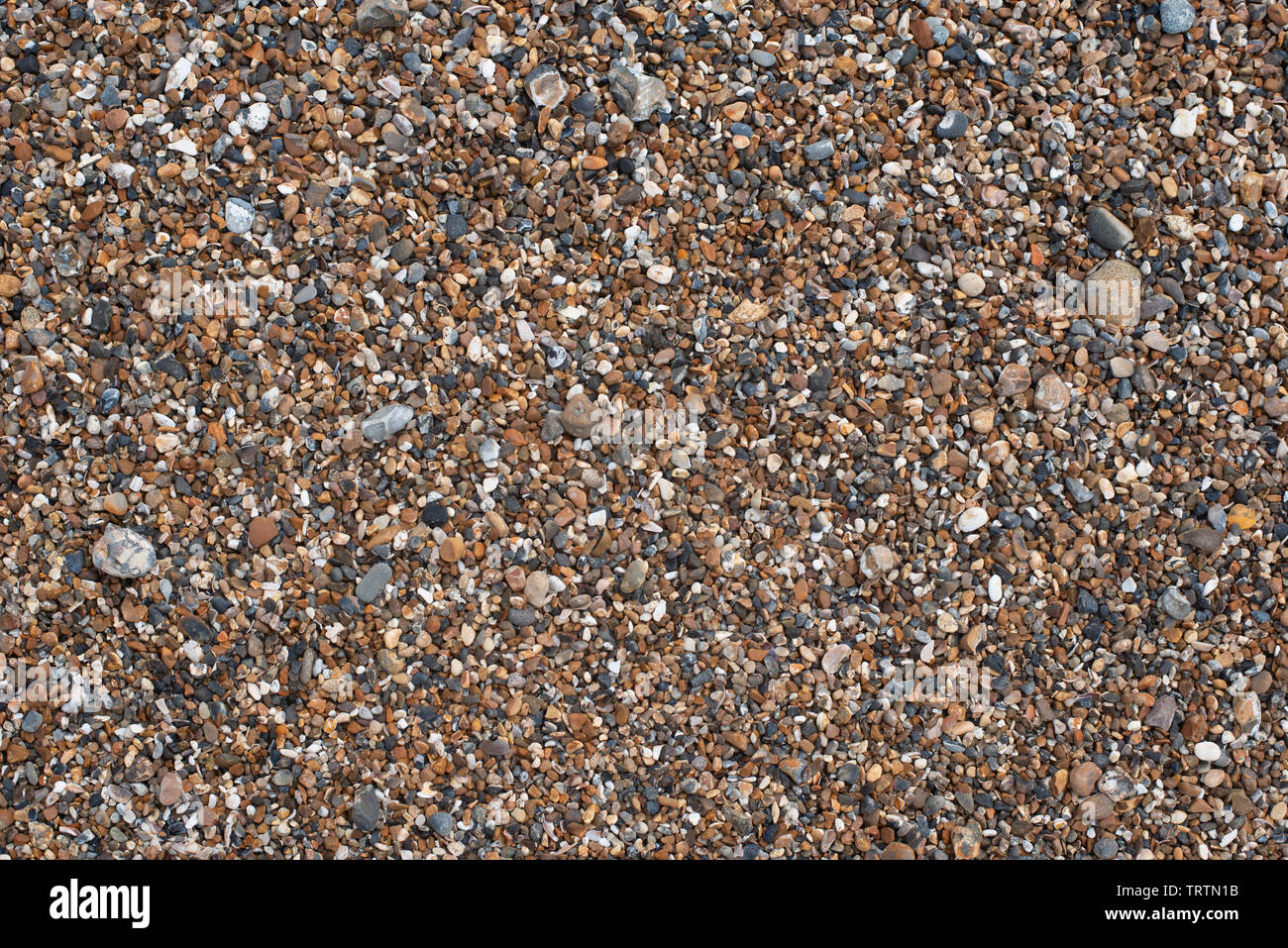 Multicoloured beach rocks hi-res stock photography and images - Alamy