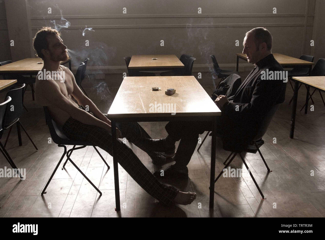 MICHAEL FASSBENDER and LIAM CUNNINGHAM in HUNGER (2008). Copyright ...