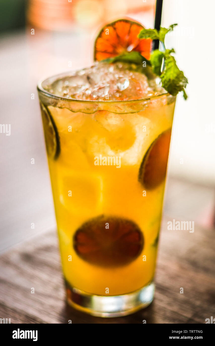 Vodka or rum with homemade falernum, ginger beer and passionfruit in a ...