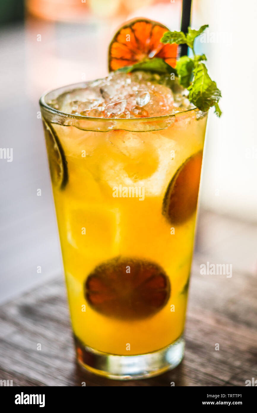 Vodka or rum with homemade falernum, ginger beer and passionfruit in a ...