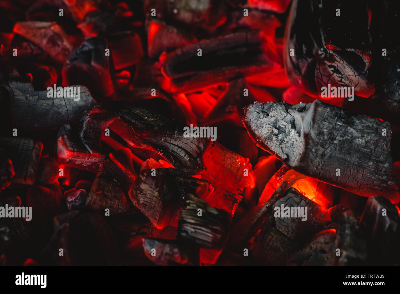 background with red hot charcoal close up Stock Photo - Alamy
