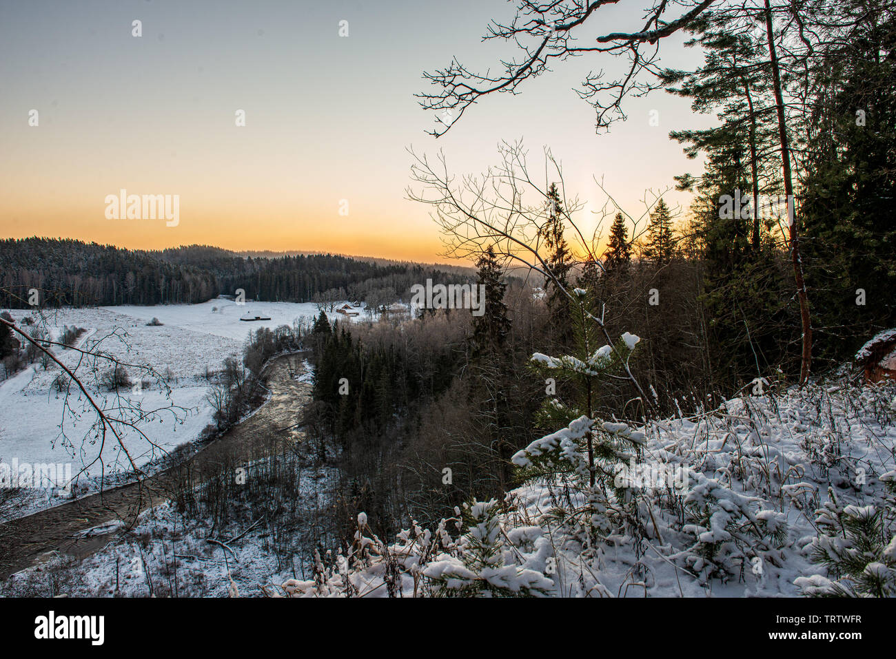 winter surise over countryside fields and forest in cold day Stock ...