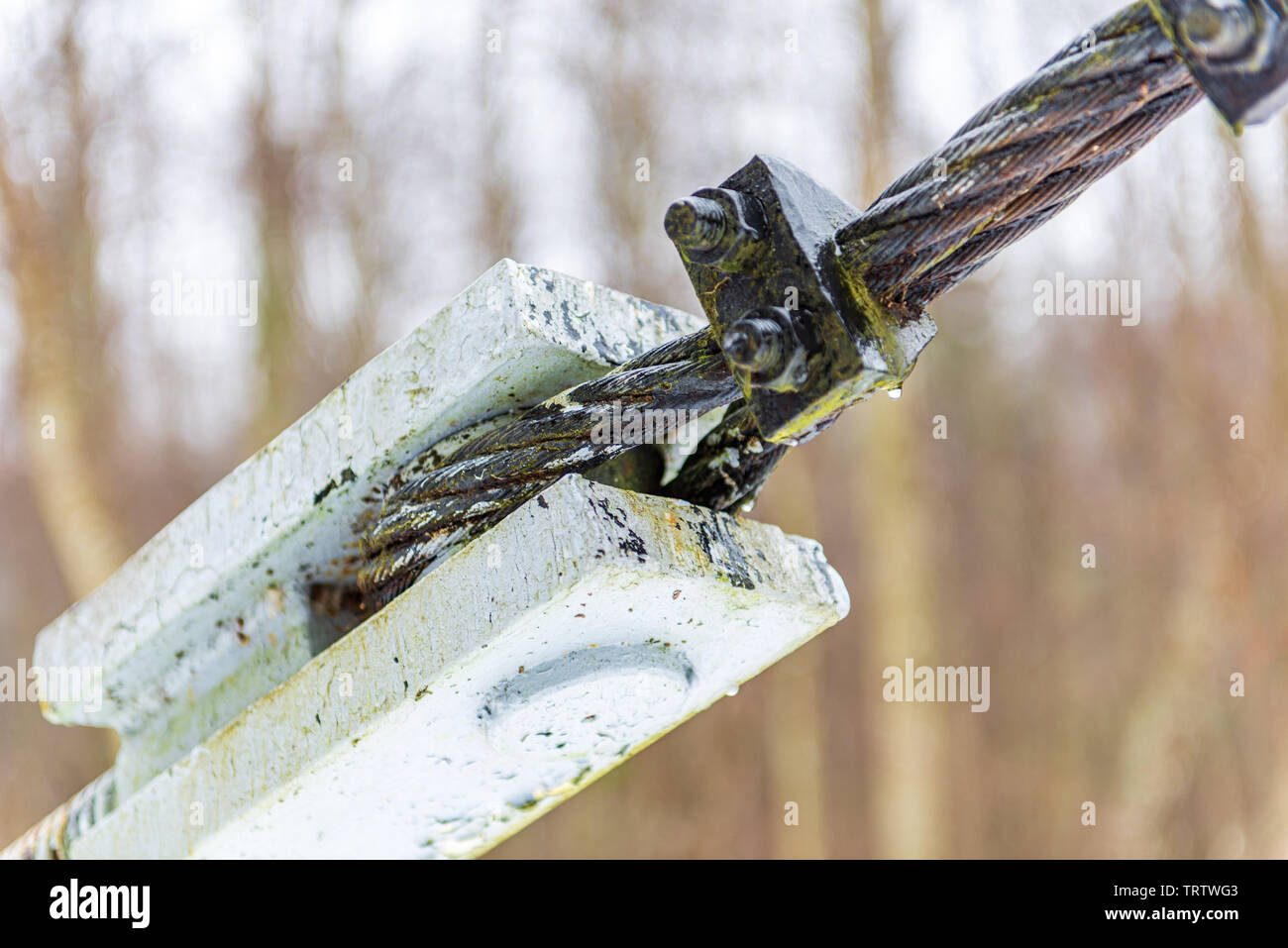 metal chain and wire rope holding bridge in place. steel construction ...