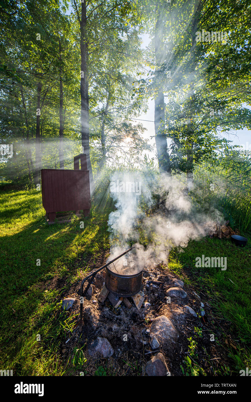 pile of fireplace log wood in open air in countryside Stock Photo - Alamy