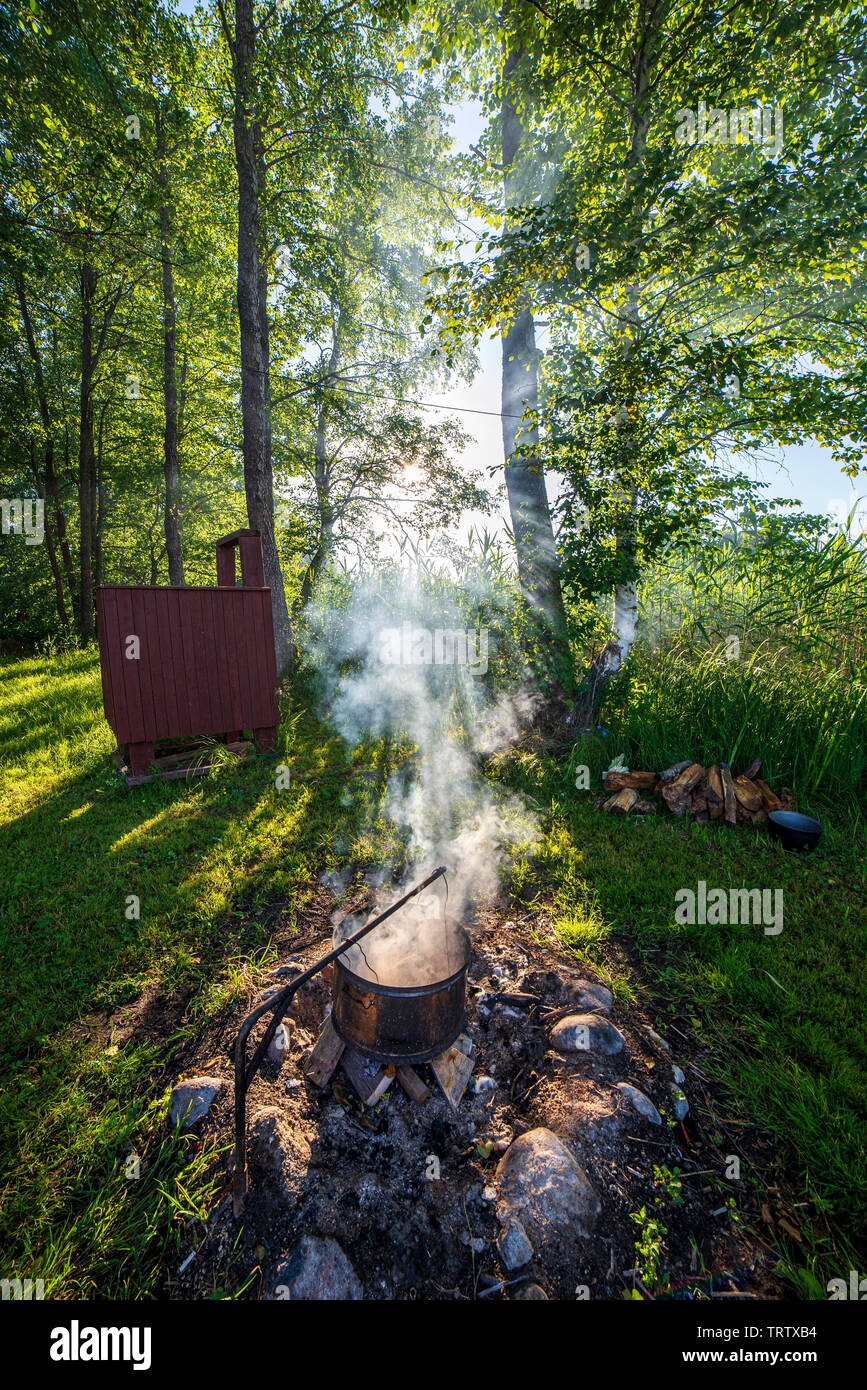 pile of fireplace log wood in open air in countryside Stock Photo - Alamy