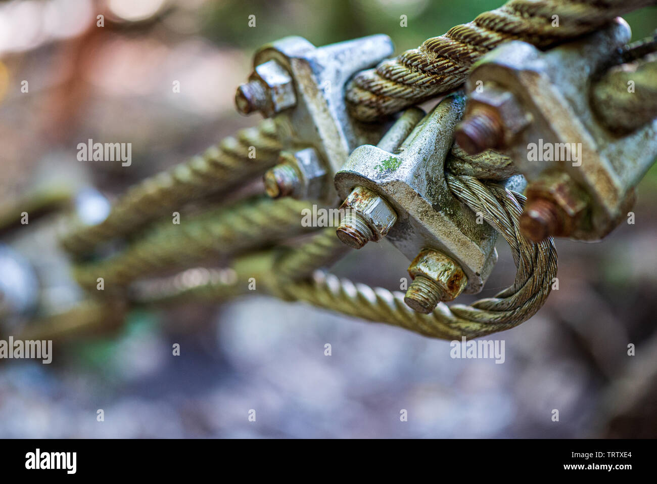metal chain and wire rope holding bridge in place. steel construction ...