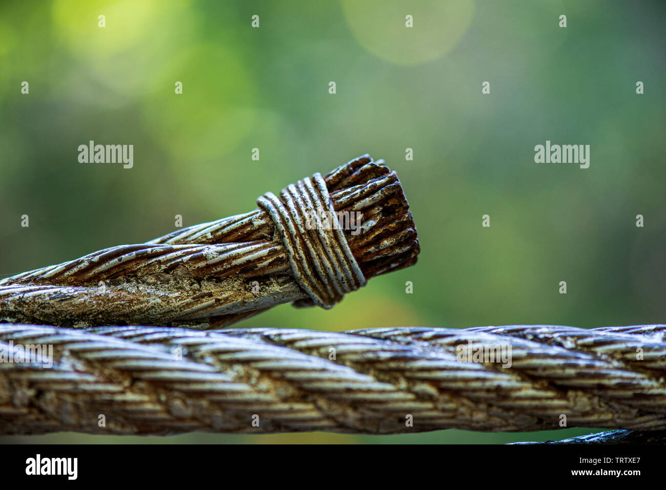 metal chain and wire rope holding bridge in place. steel construction ...