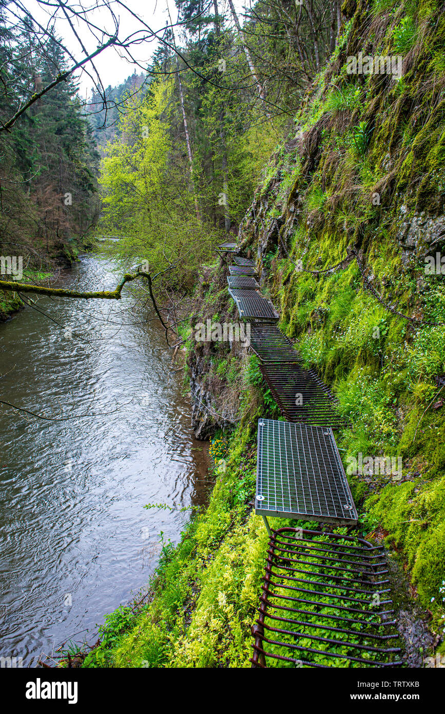 metal chain and wire rope holding bridge in place. steel construction ...