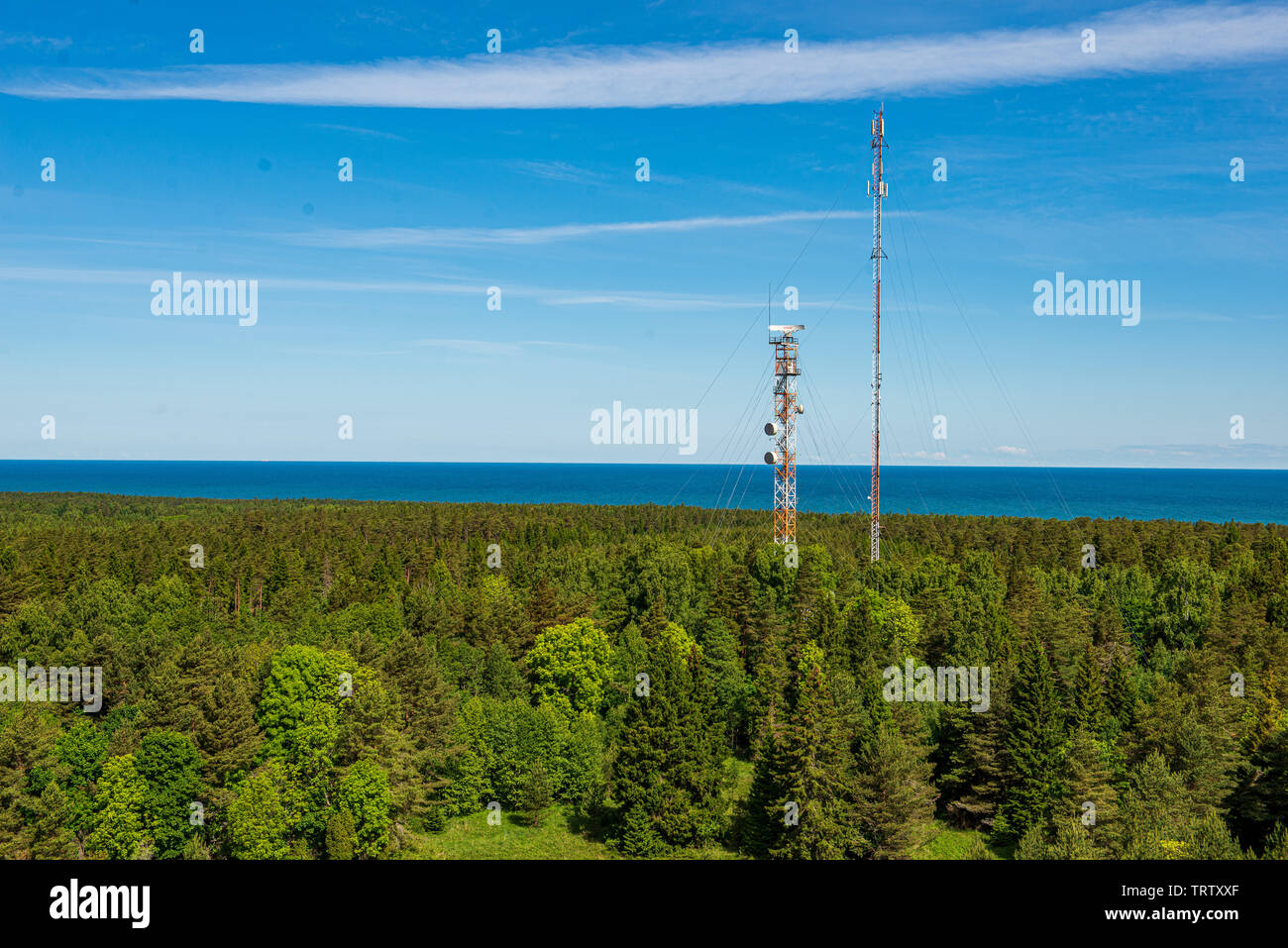 electricity power line poles construction in middle of fields in ...
