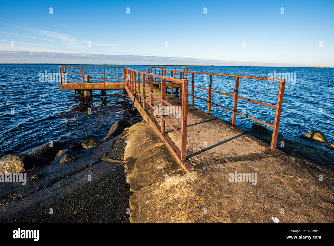 concrete brick bridge over the river with high clear water stream Stock ...
