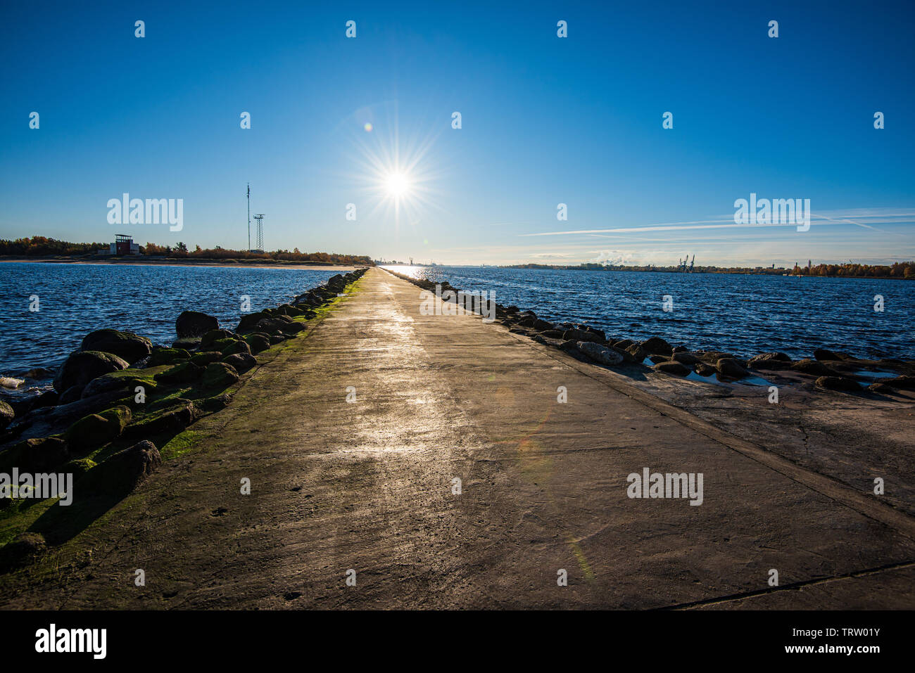 concrete brick bridge over the river with high clear water stream Stock ...