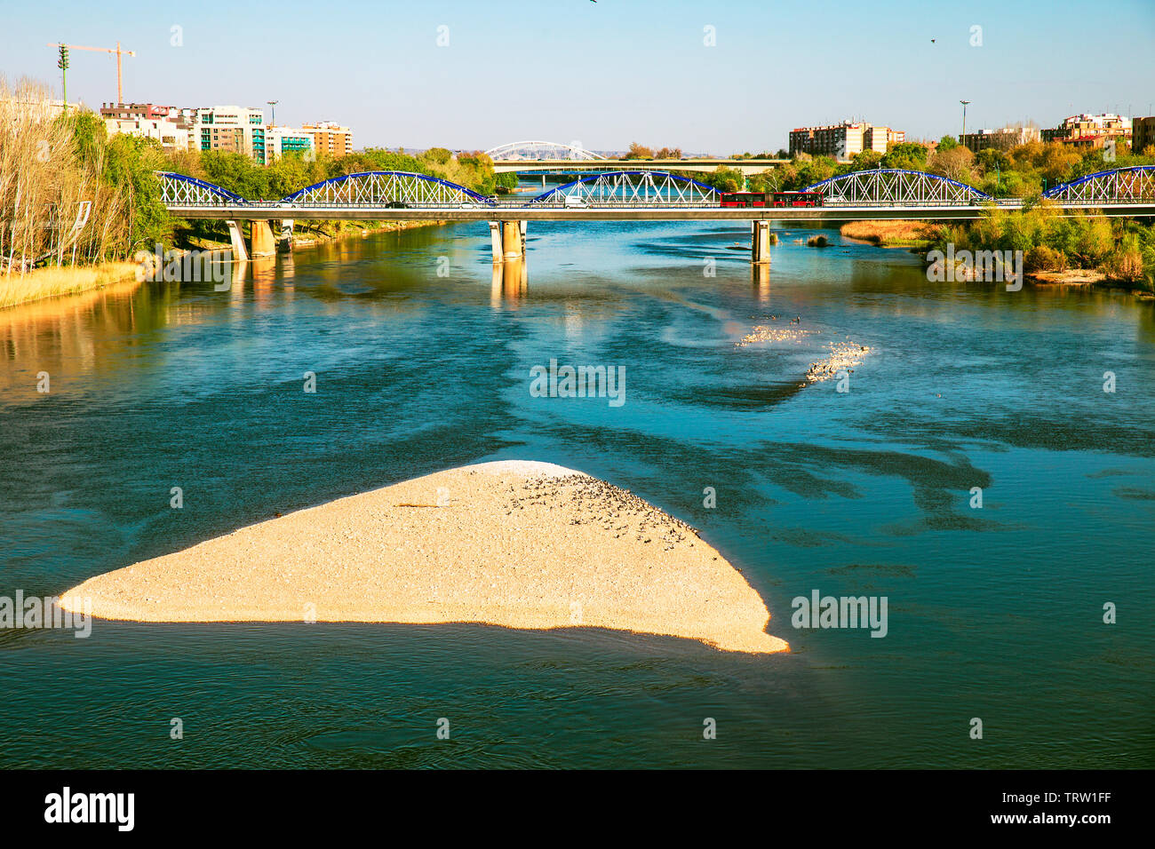 view of arch of stone bridge on Ebro river in Zaragoza city, Spain ...