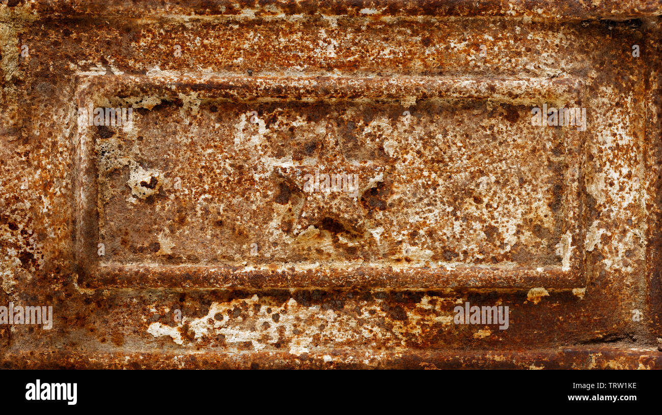 Backgrounds and textures: very old rusty cast-iron panel with star ...