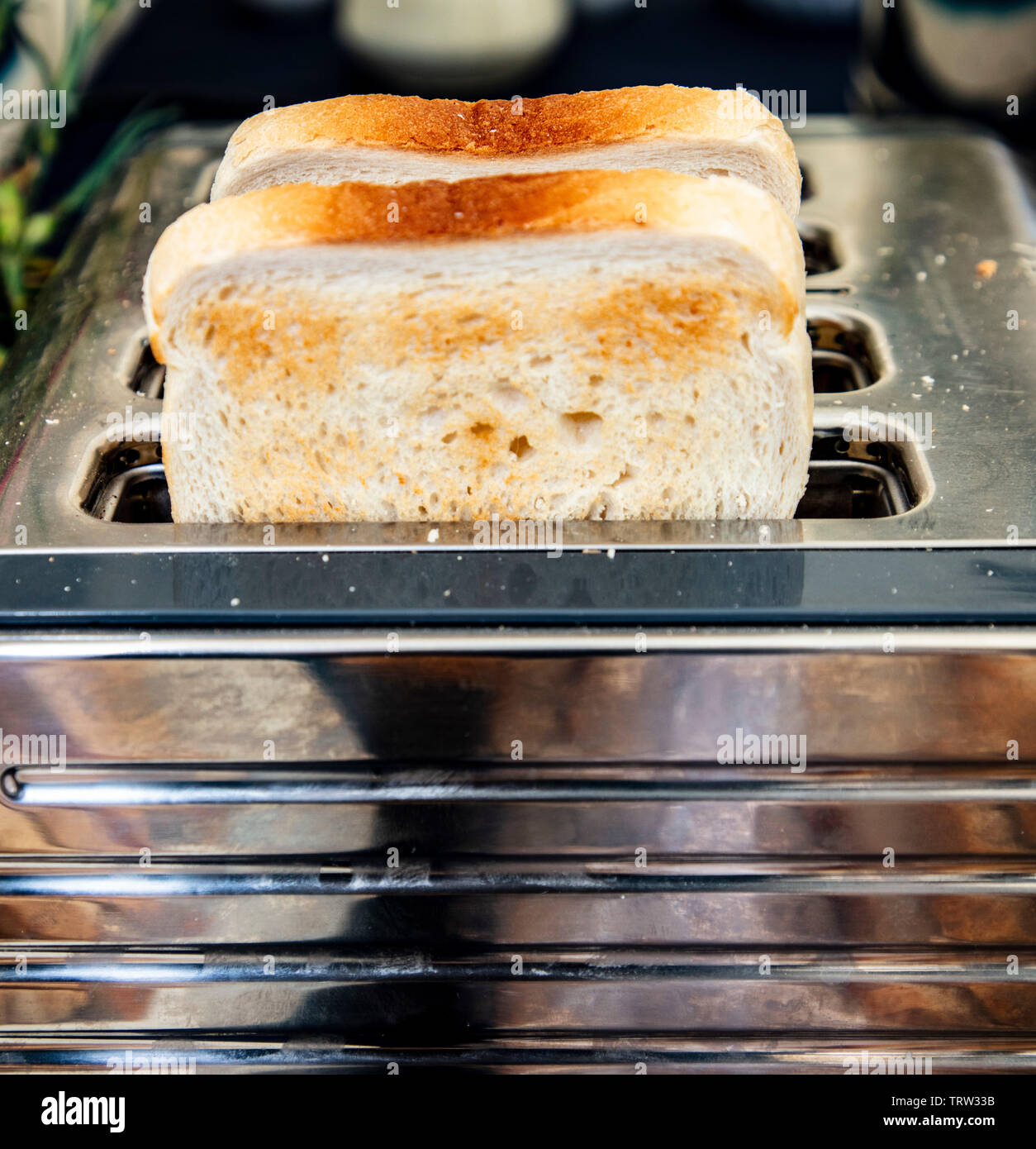 Toast in a Metal Electric Toaster Stock Photo - Alamy