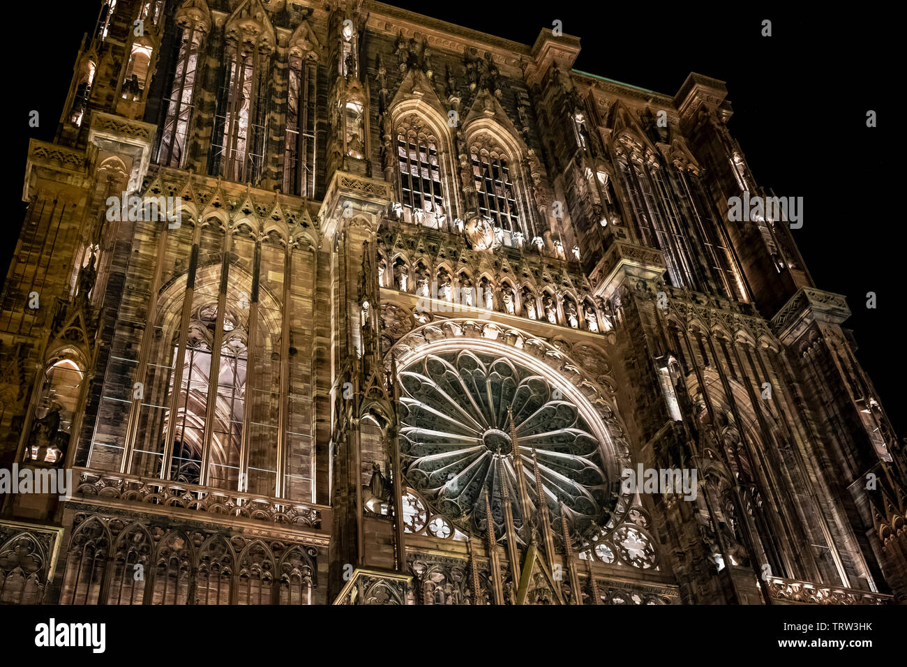 Notre-Dame gothic cathedral 14th century at night, rose window ...