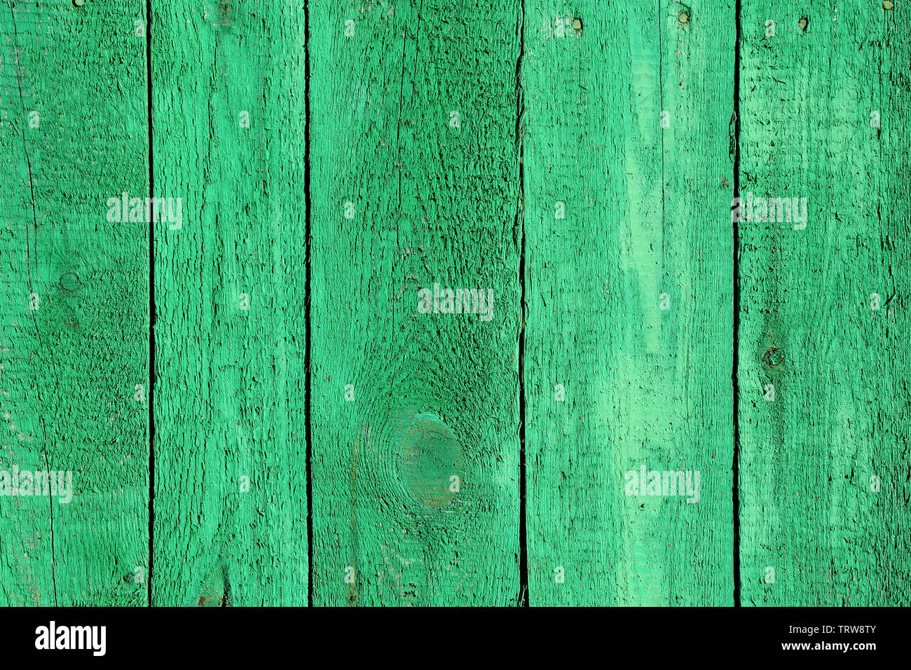 Wooden fence painted in green color Stock Photo - Alamy