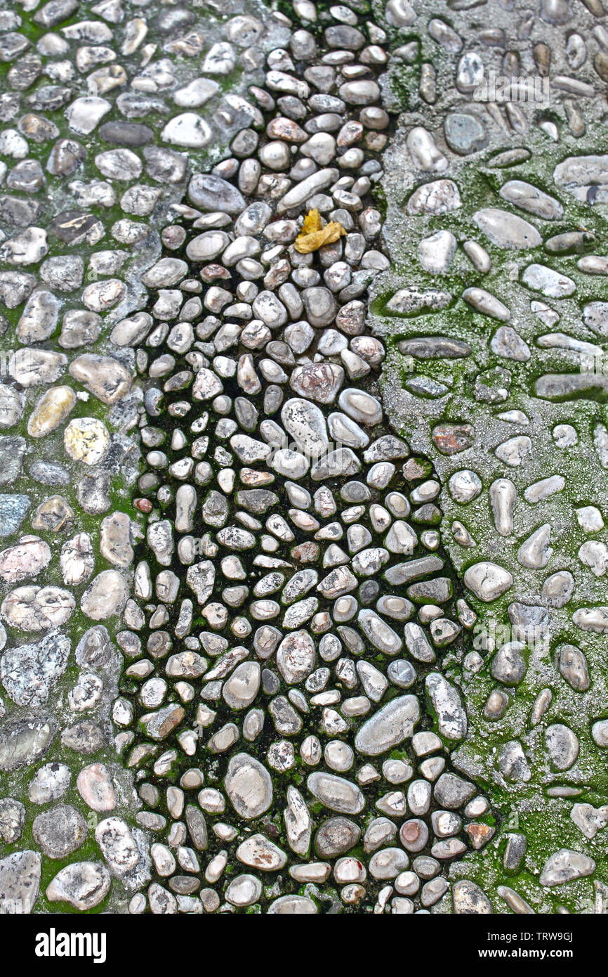 Texture of old road paved with stones Stock Photo - Alamy