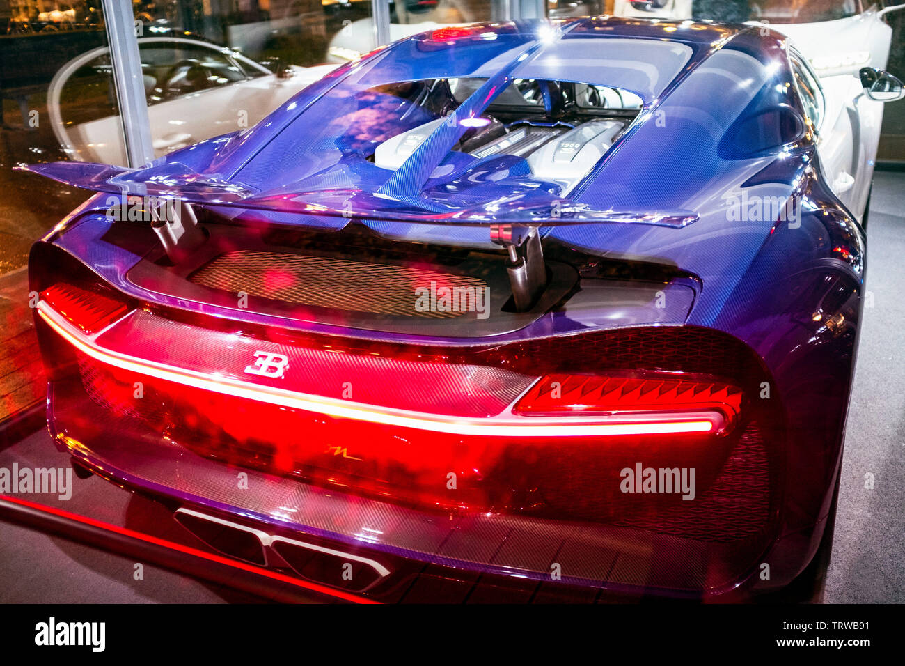 Bugatti Chiron car on display in showcase, night, Strasbourg, Alsace ...