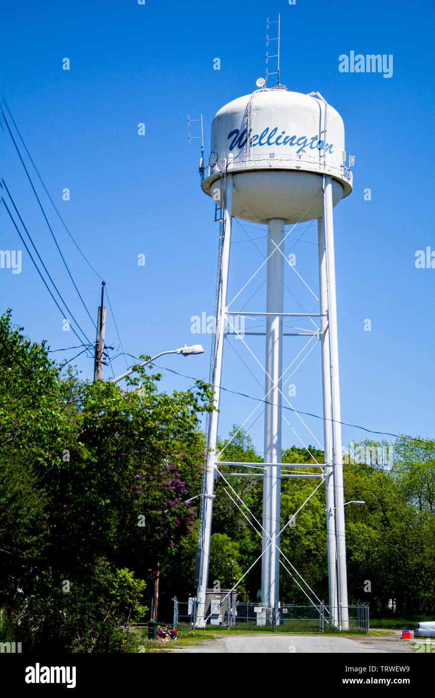 White water tower on a sunny day in a small town in Ontario Stock Photo ...