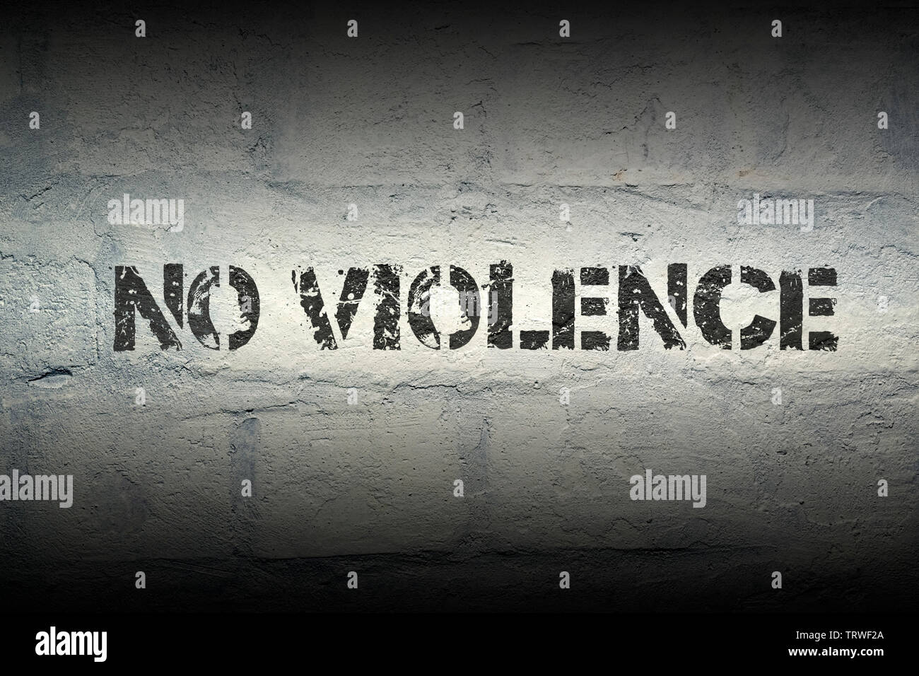 no violence stencil print on the grunge white brick wall Stock Photo ...