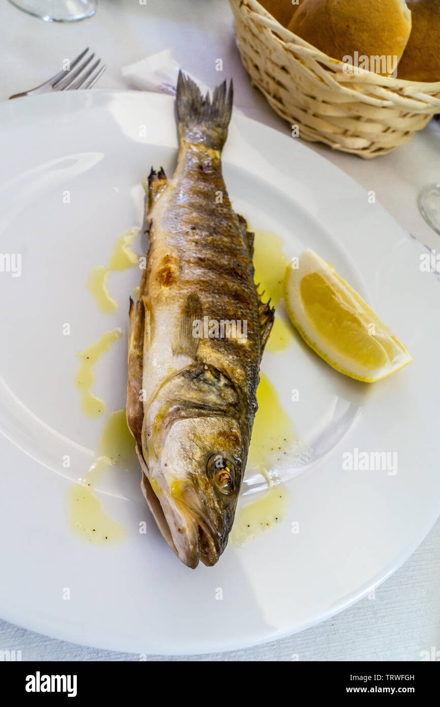 Whole grilled sea bass hi-res stock photography and images - Alamy