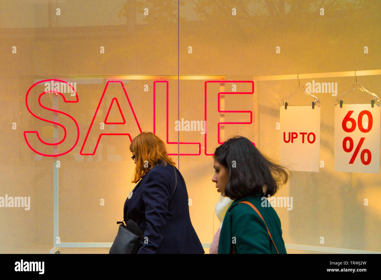 Clothing shop sale sign in Manchester high street stores Stock Photo ...