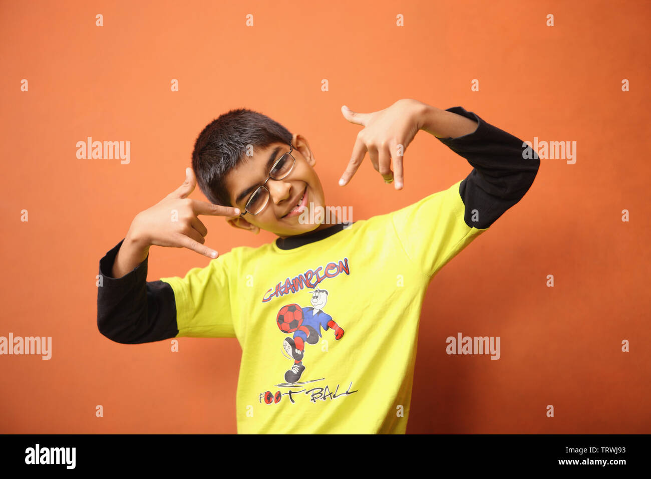 Boy making hip hop sign Stock Photo - Alamy