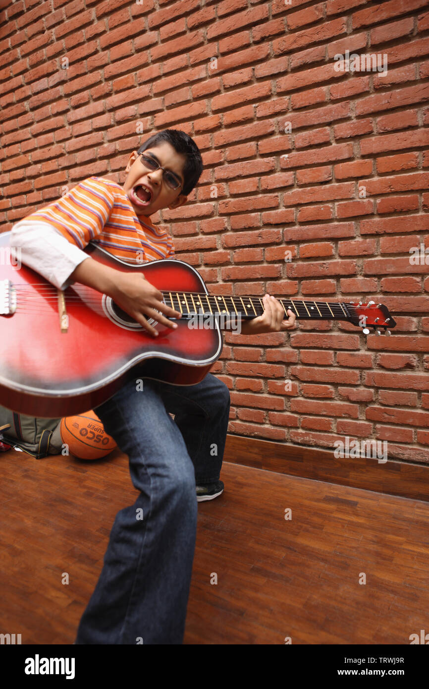 Full image of boy singing hi-res stock photography and images - Alamy