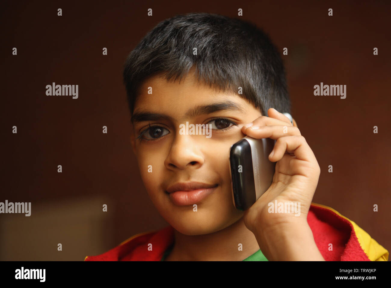 Indian child boy phone talking hi-res stock photography and images - Alamy