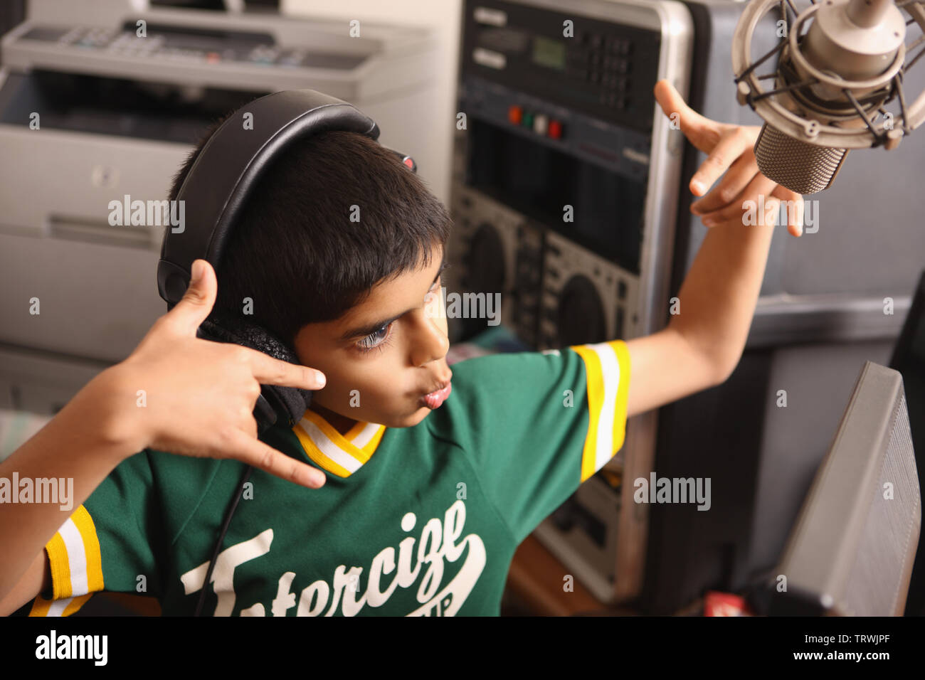 Boy disc jockey in a radio studio Stock Photo - Alamy