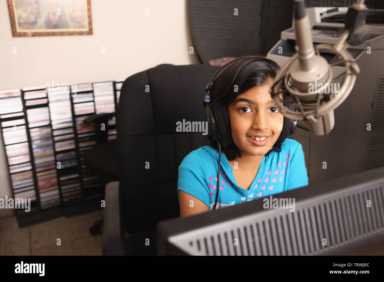 Girl disc jockey in a radio studio Stock Photo - Alamy