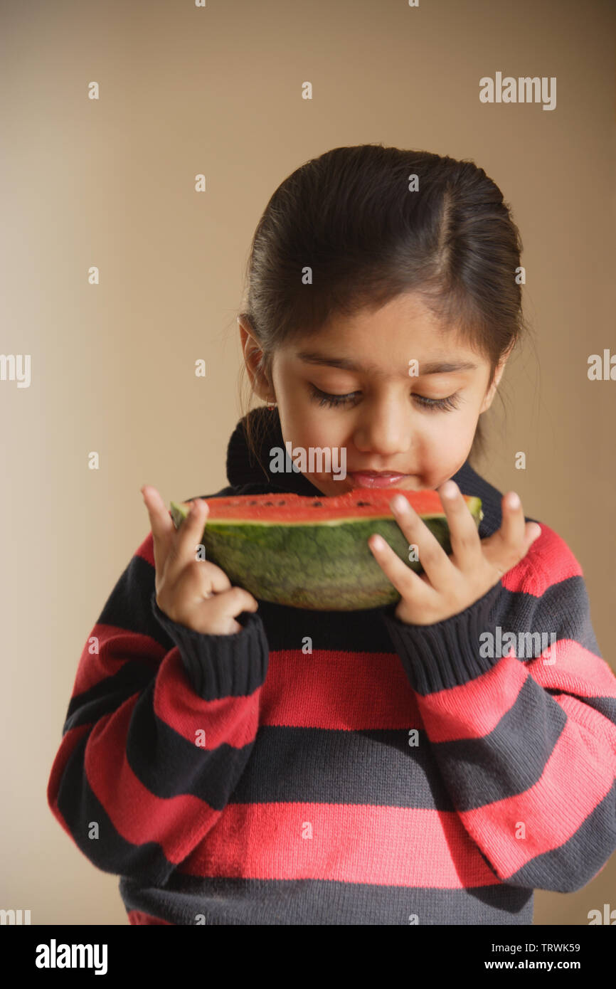 Black girl eating watermelon fruit hi-res stock photography and images ...