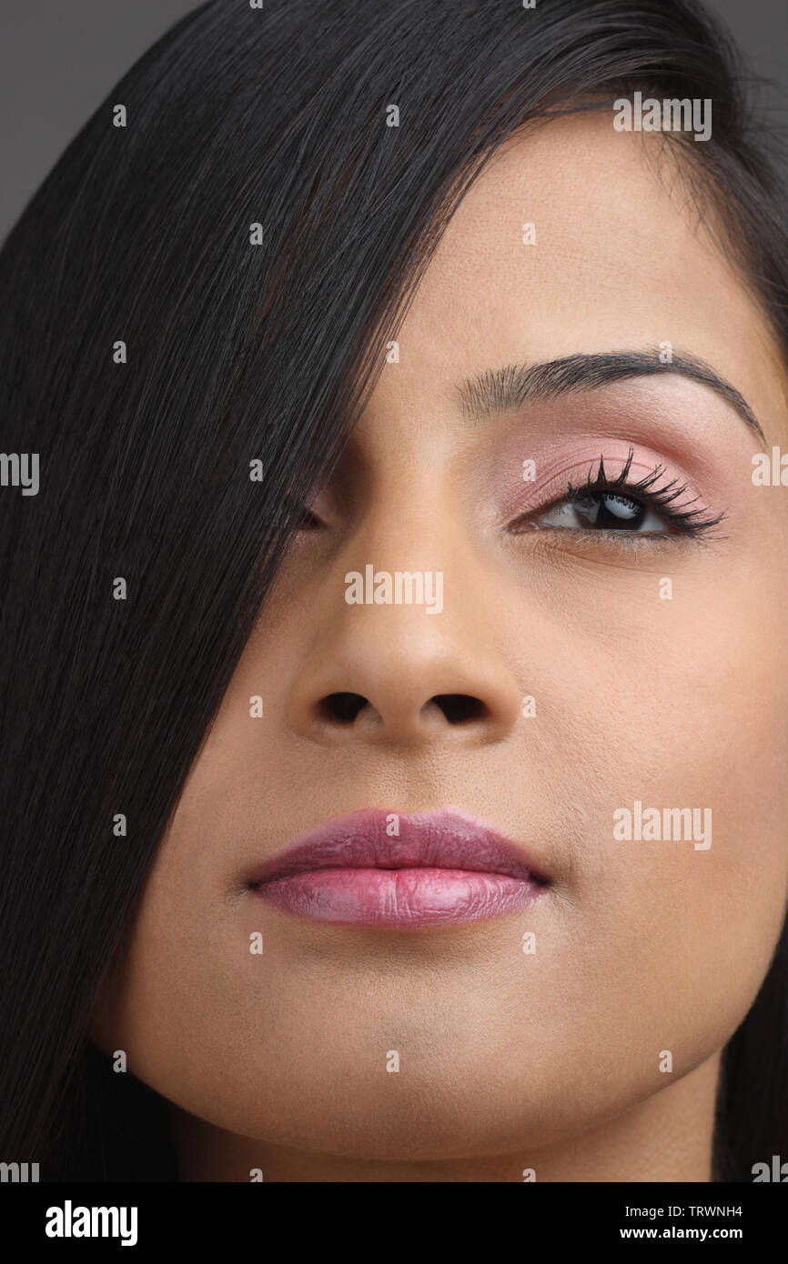 Woman beauty long hair over eye hi-res stock photography and images - Alamy