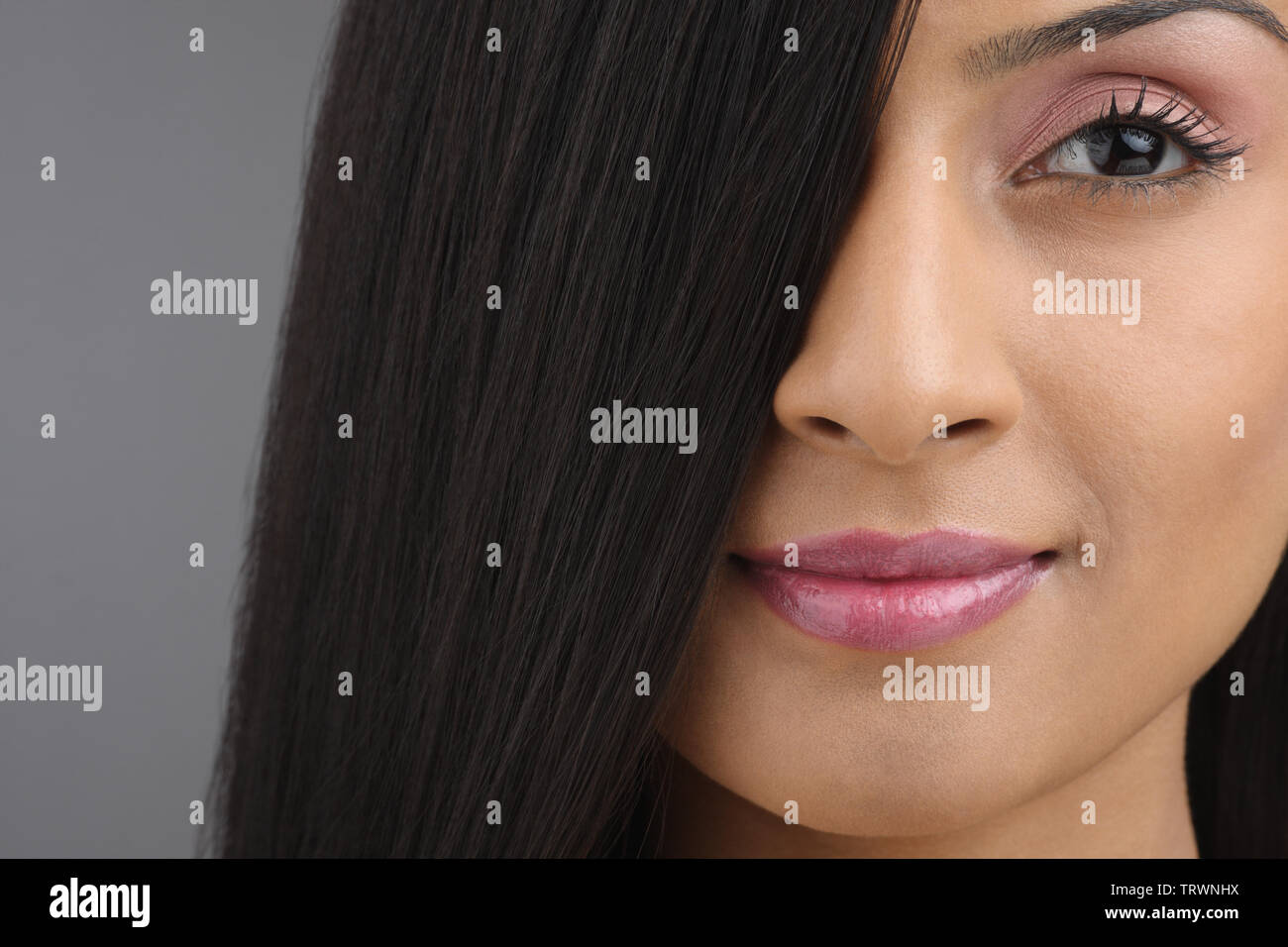 Woman beauty long hair over eye hi-res stock photography and images - Alamy