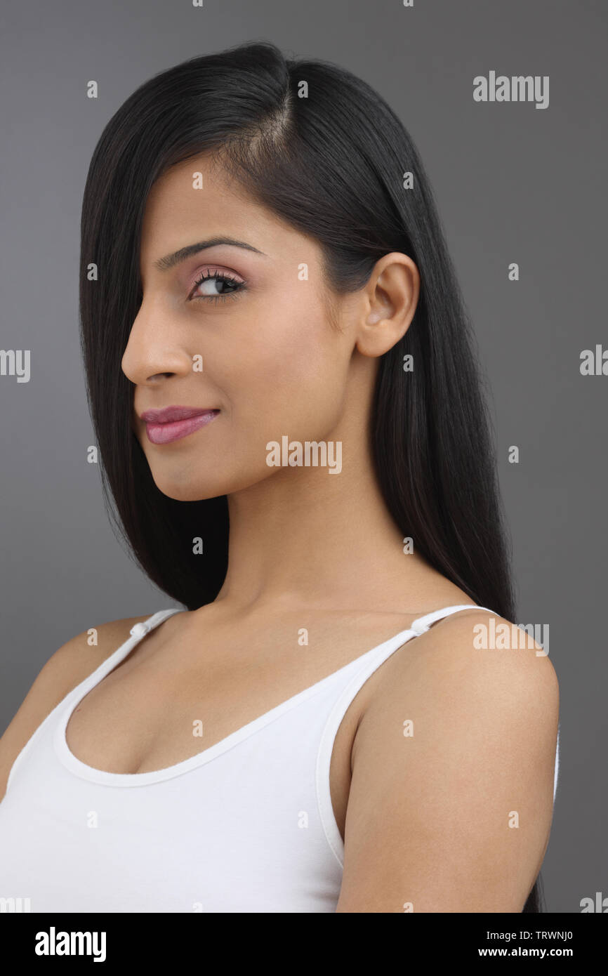 Close up of a woman with hair over face Stock Photo - Alamy