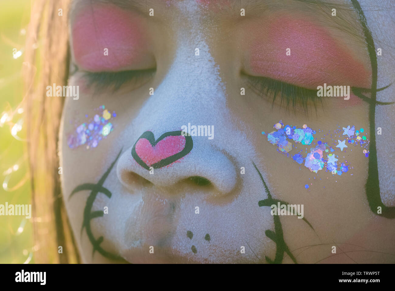Heart face paint hi-res stock photography and images - Alamy