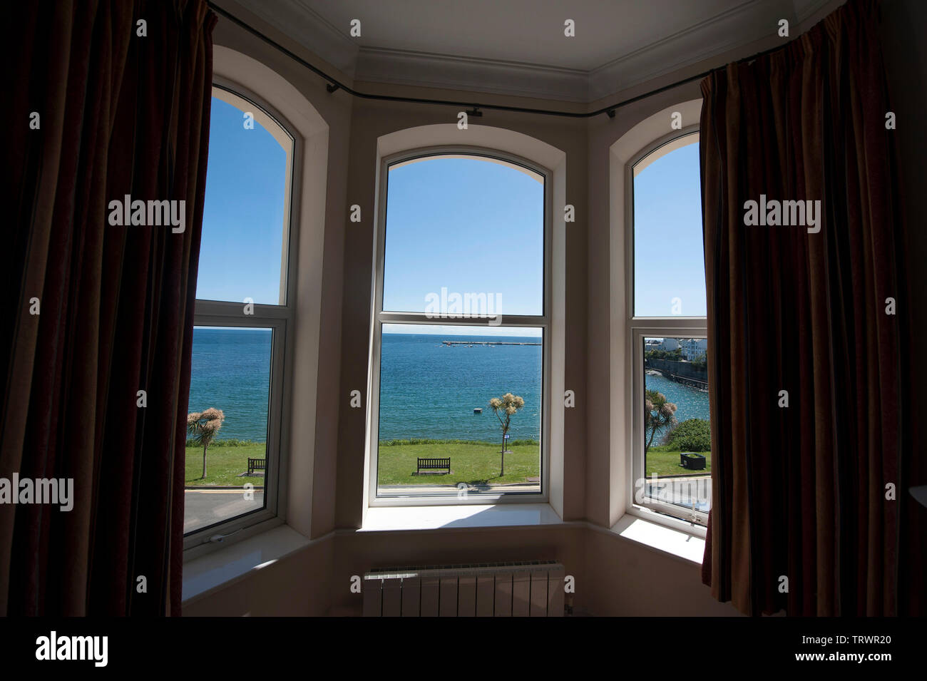 Picture bay window, looking out over Chapel Beach and the harbour at ...
