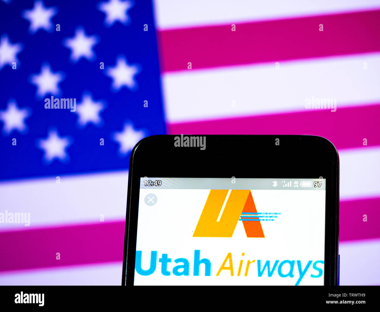 In this photo illustration the Utah Airways logo is seen displayed on a ...