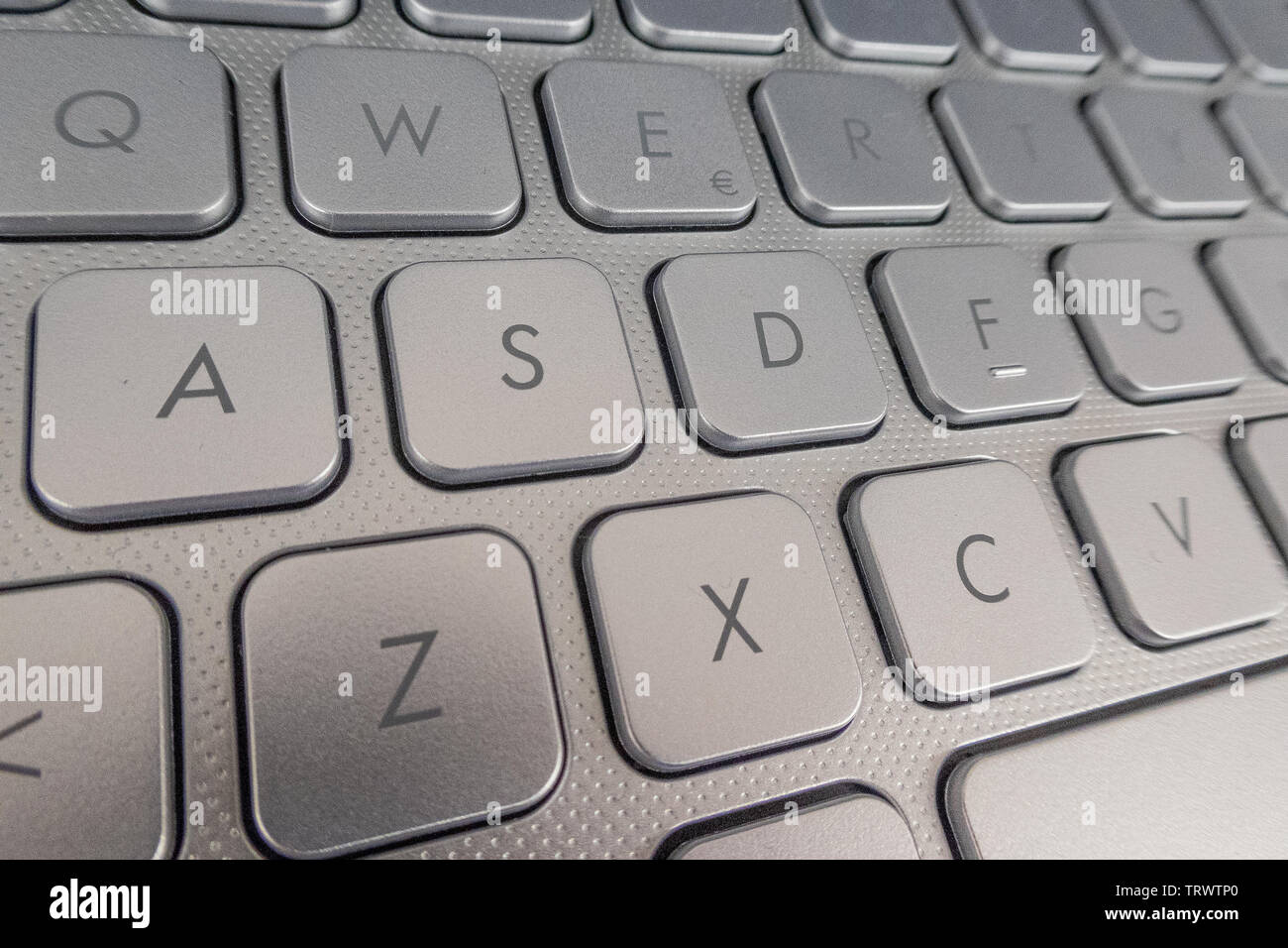 Close-up detail of a QWERTY keyboard of a laptop PC, still life of ...