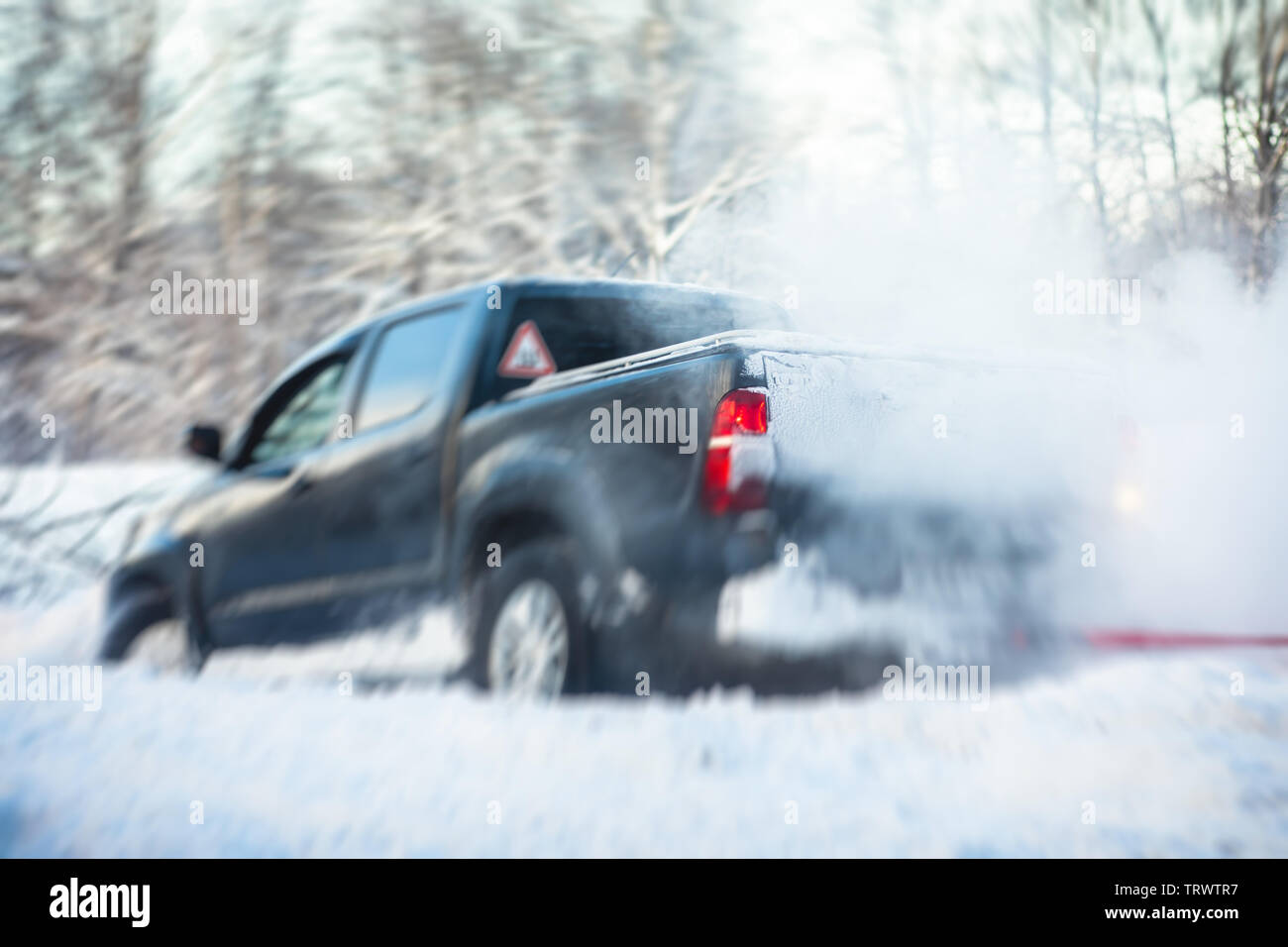 Process of taking out suv car stuck in snow, men digging and pushing ...