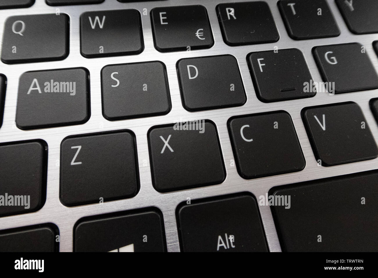 Close-up detail of a QWERTY keyboard of a laptop PC, still life of ...