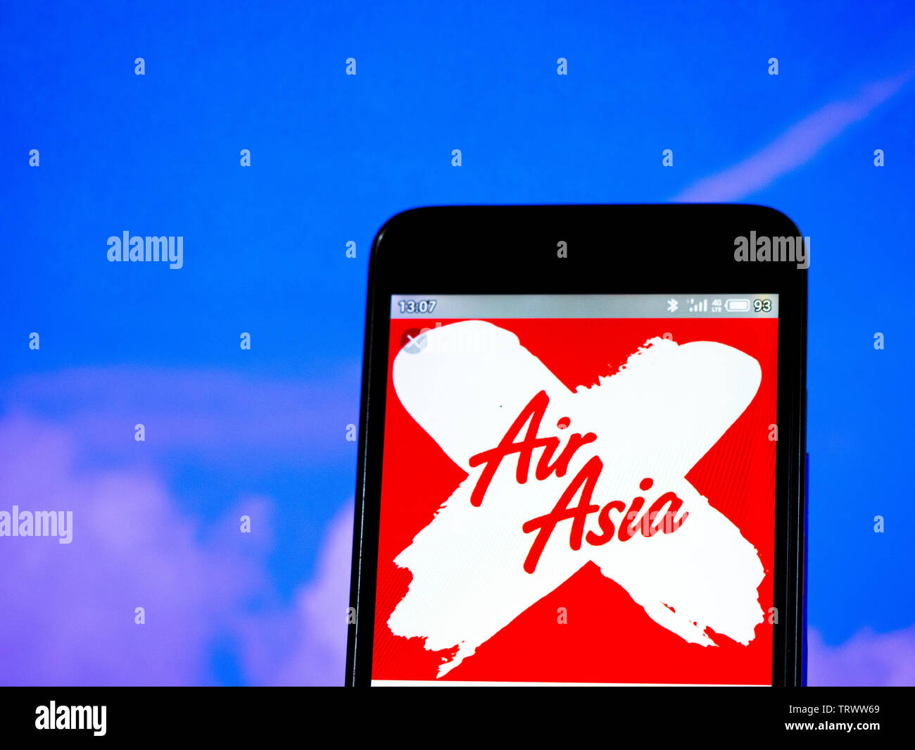 In this photo illustration the AirAsia logo is seen displayed on a ...