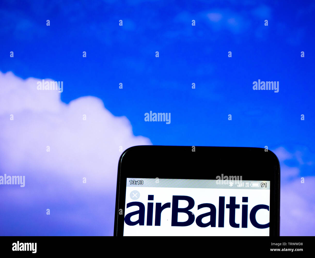 In this photo illustration the airBaltic logo is seen displayed on a ...