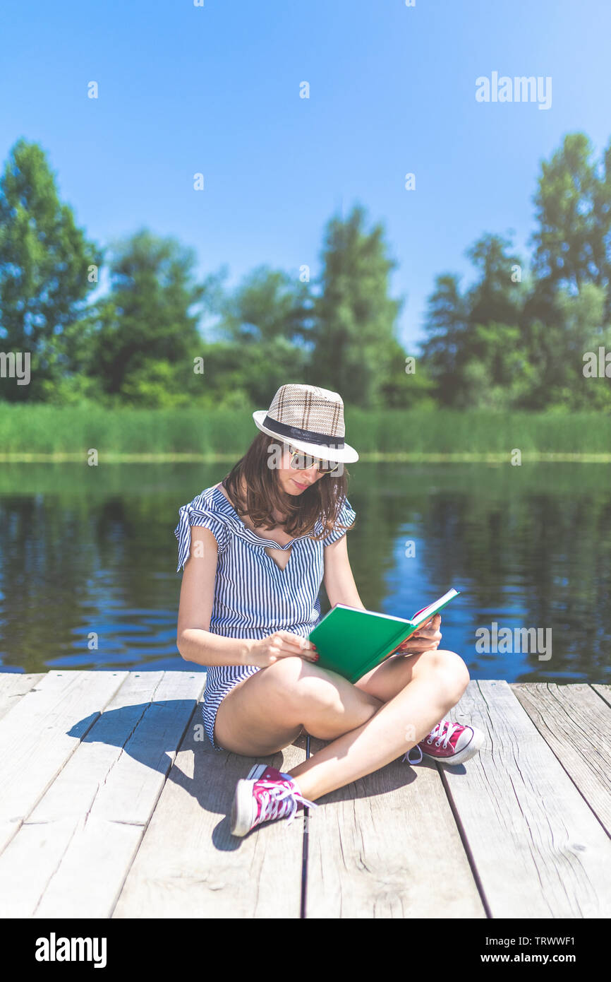 Relaxing on the dock hi-res stock photography and images - Alamy