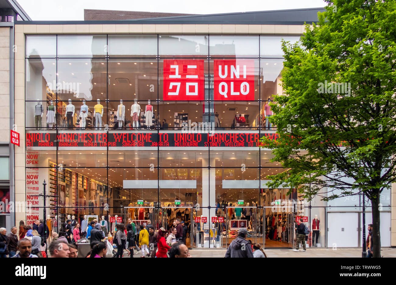 Shoppers walking past the UNIQLO Manchester store, Market Street ...